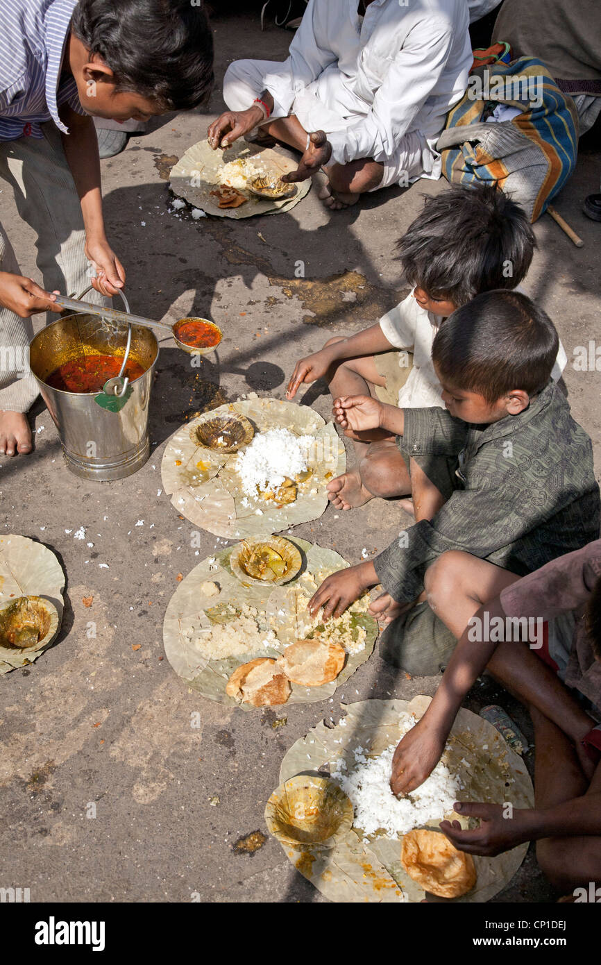 Charity food for street kids. Nasik. India Stock Photo - Alamy