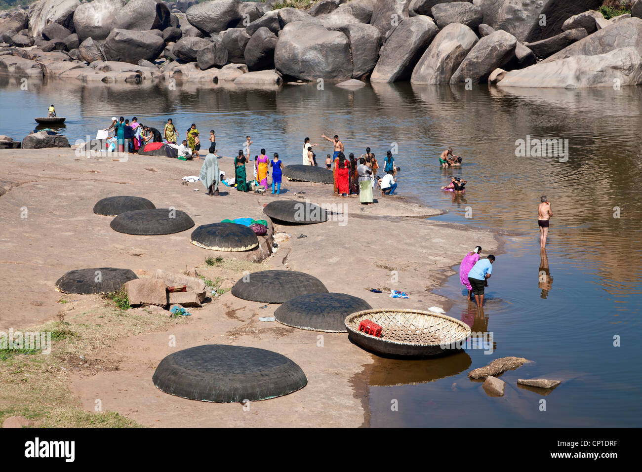 People bathing in the river. Hampi. Karnataka. India Stock Photo - Alamy