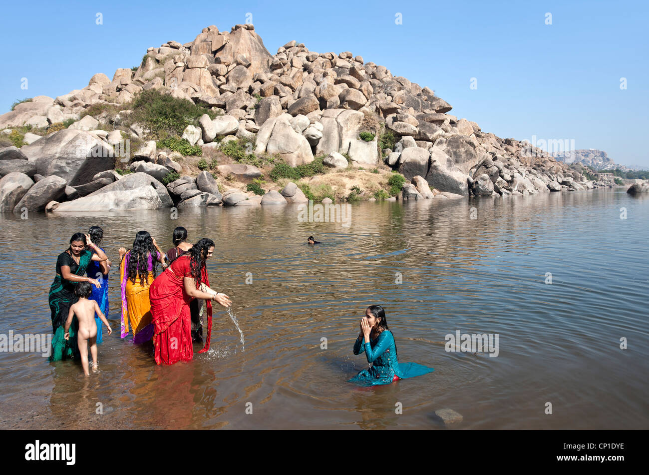 Women bathing in the Tungabhadra river. Hampi. Karnataka. India Stock ...