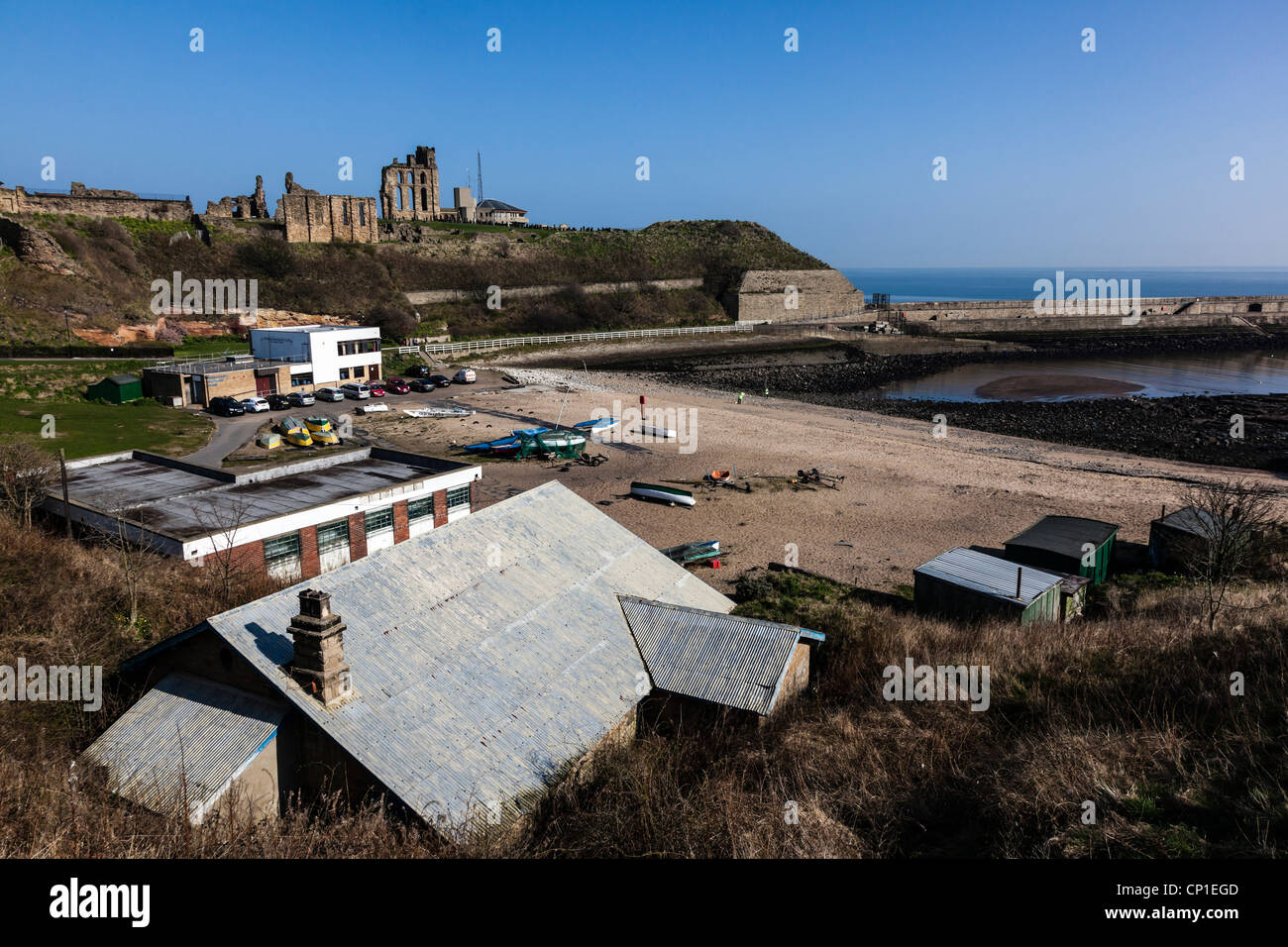 View across the beach at Tynemouth, with the sailing club, castle and ...