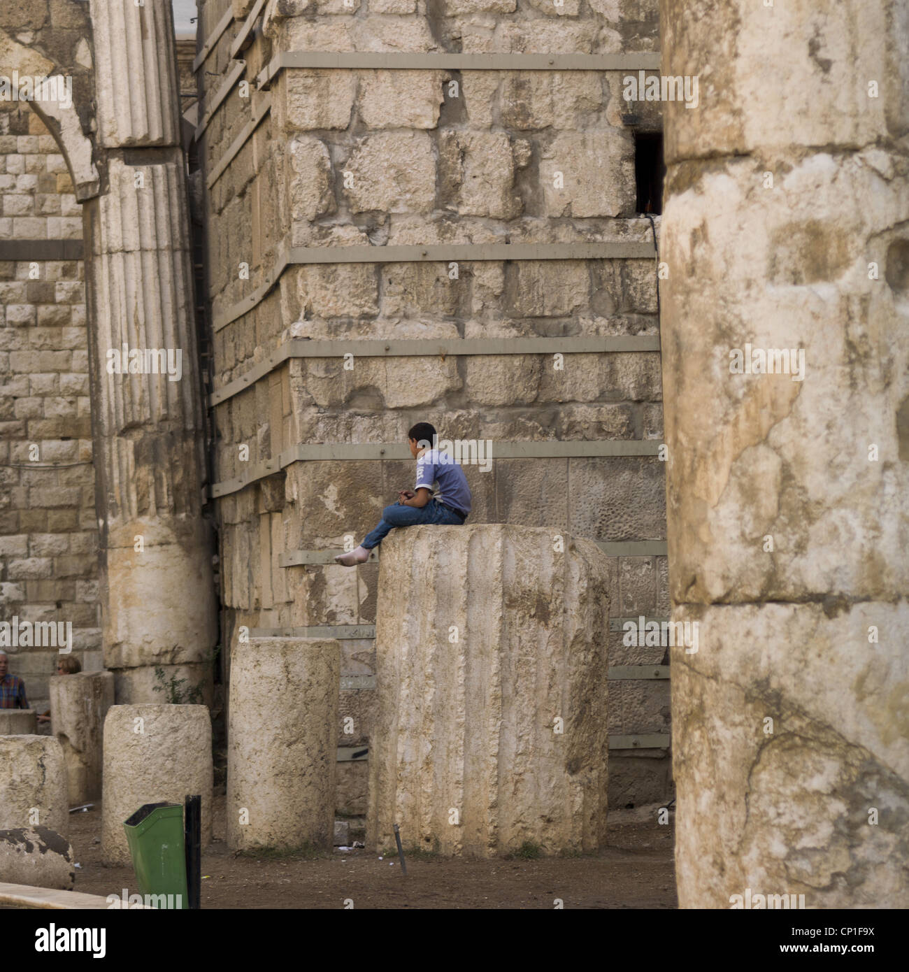 Kid Sit On A Roman Column In Damascus, Syria Stock Photo - Alamy