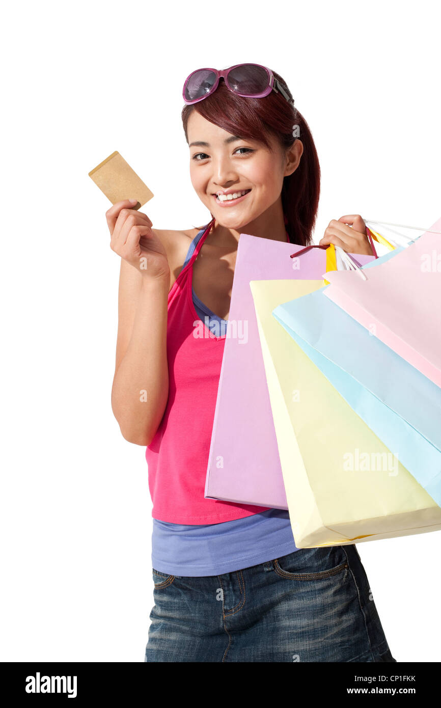 Stylish young woman going shopping Stock Photo - Alamy