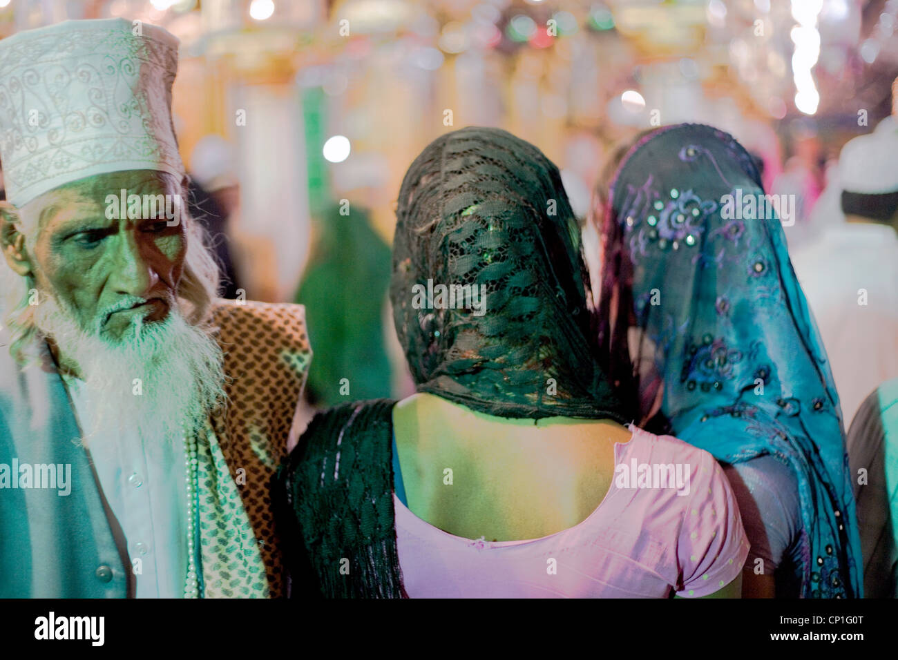 Muslim devotee and hijras inside the Nizamuddin dargah in Delhi Stock ...