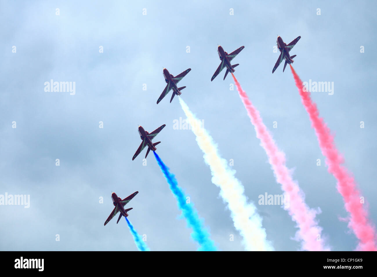 RAF Red Arrows flying in formation over Glorious Goodwood Stock Photo ...
