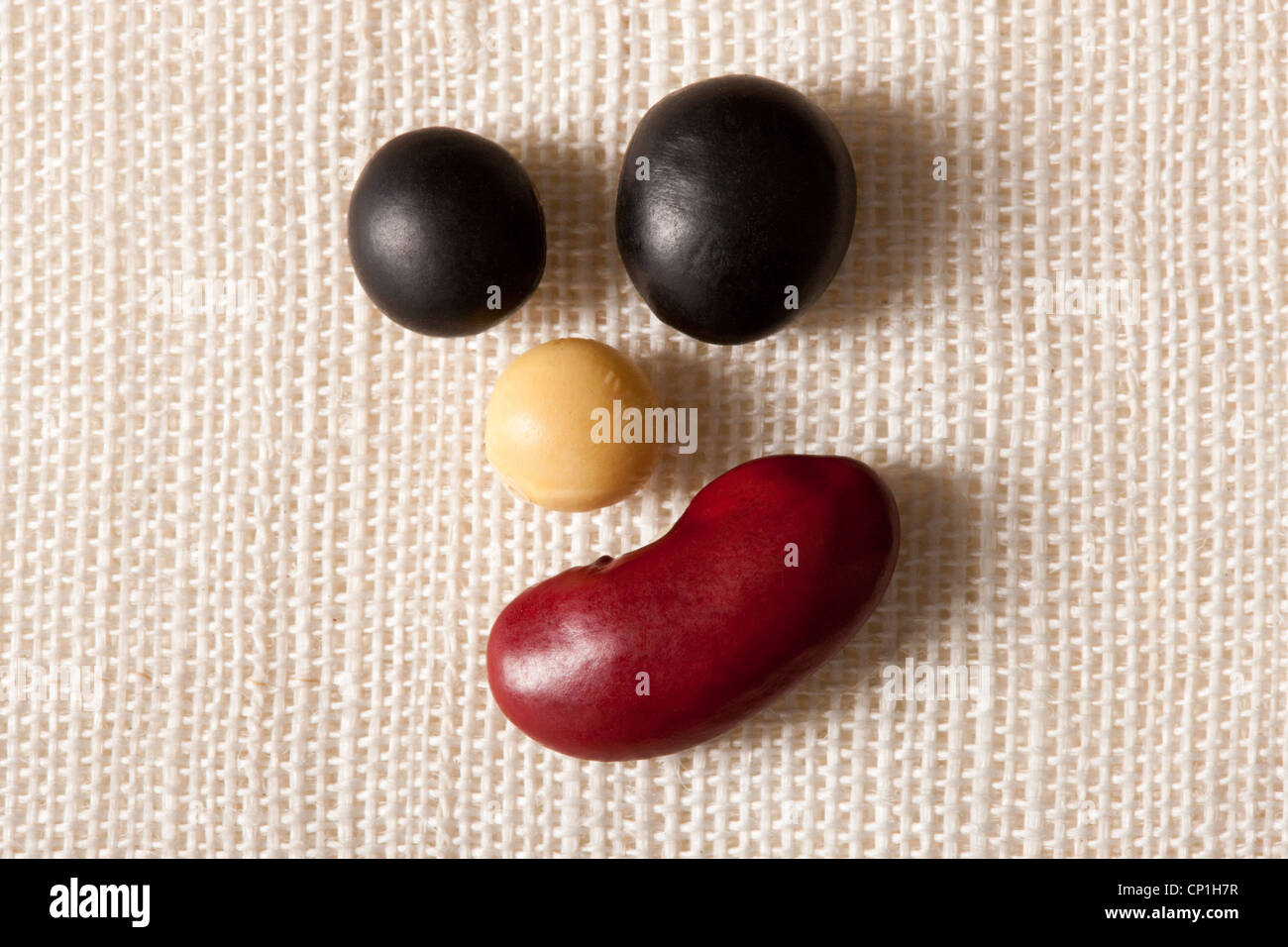 Close-up of a creative face made of different beans Stock Photo - Alamy