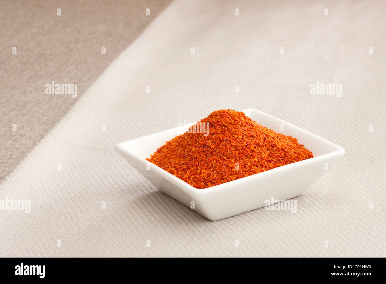 Close-up of red chilli powder Stock Photo - Alamy