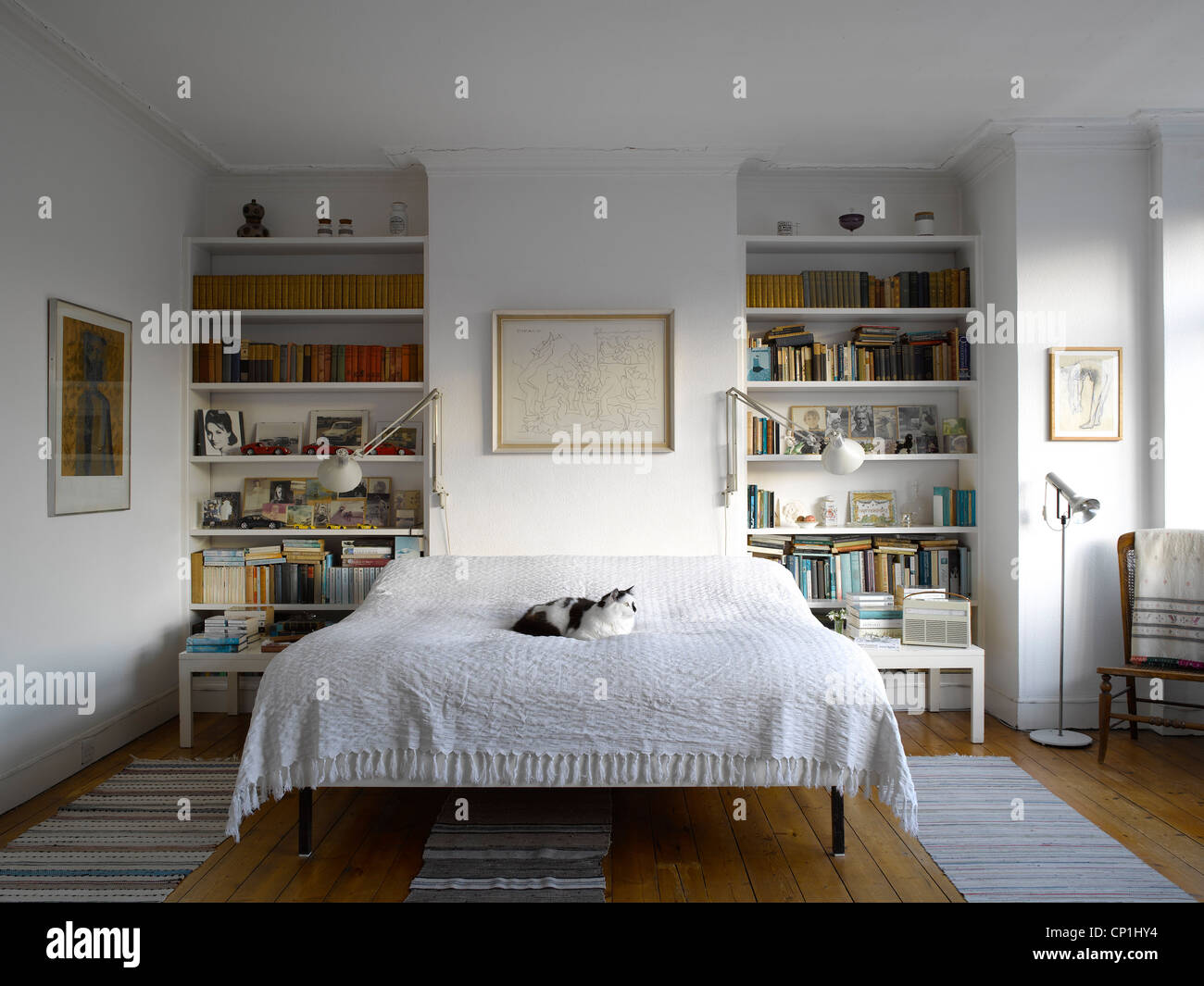 Bedroom with bookcases Stock Photo - Alamy