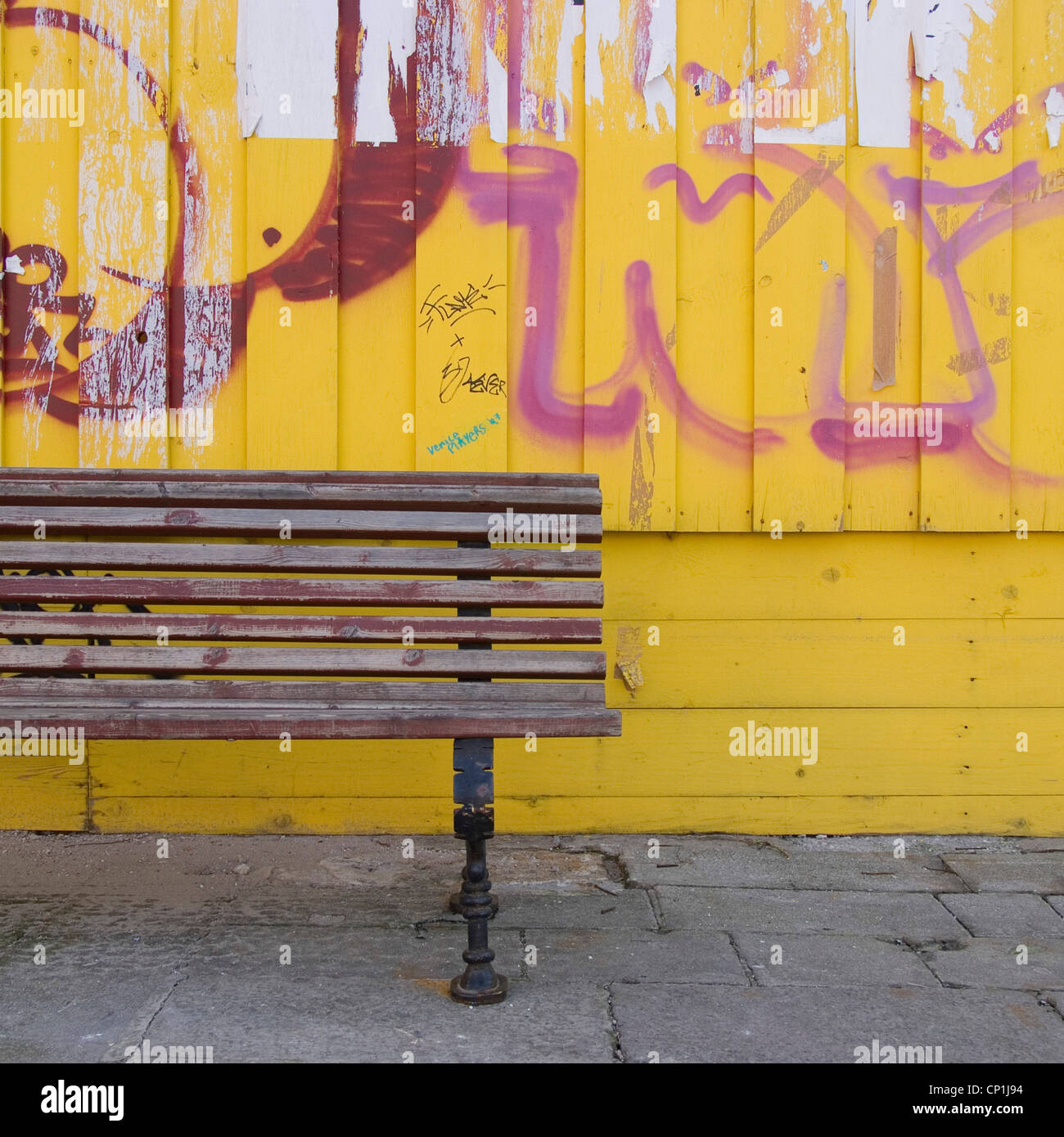 Wooden bench in street with graffiti, Venice Stock Photo - Alamy