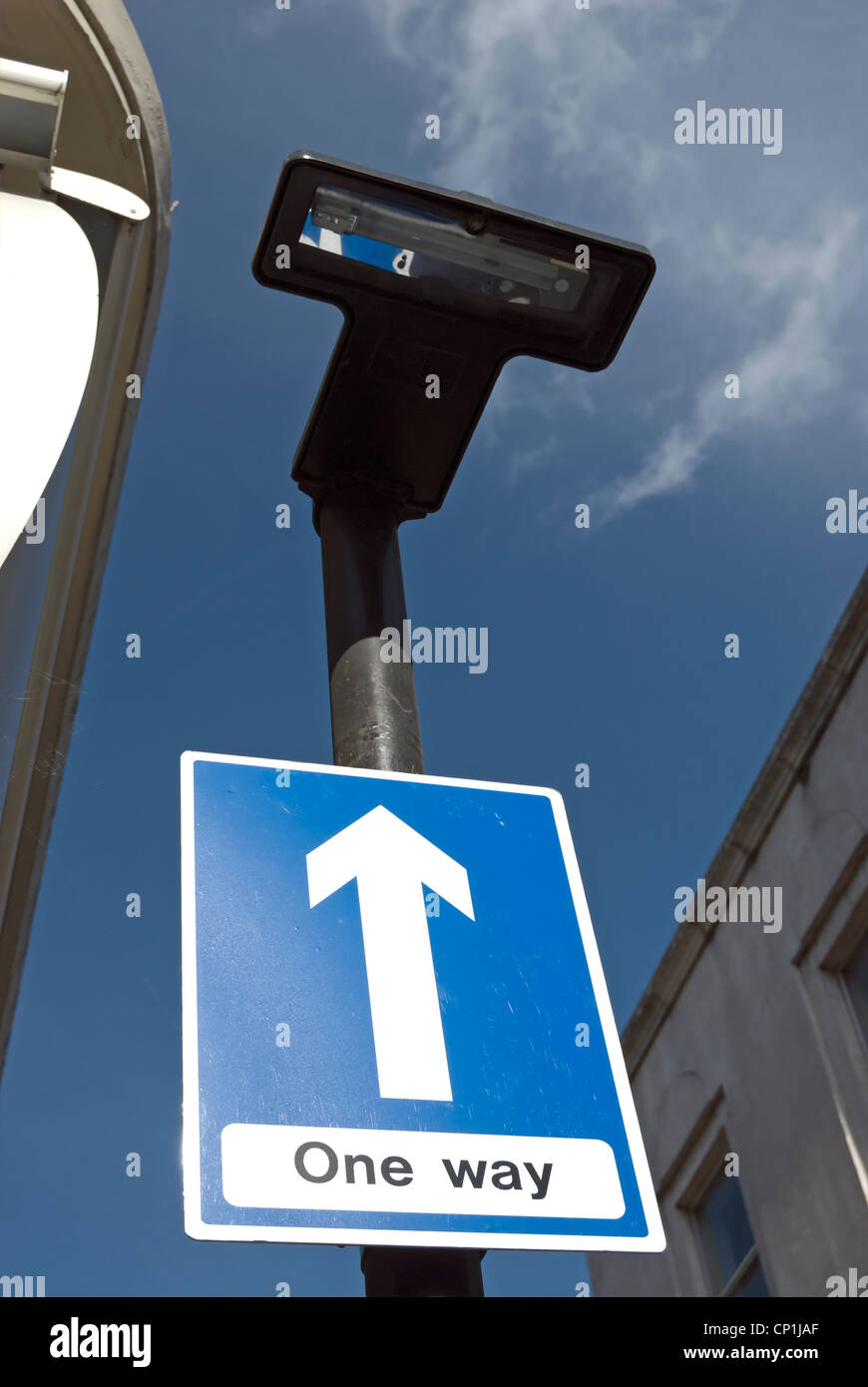 british one way street road sign with arrow and wording Stock Photo - Alamy