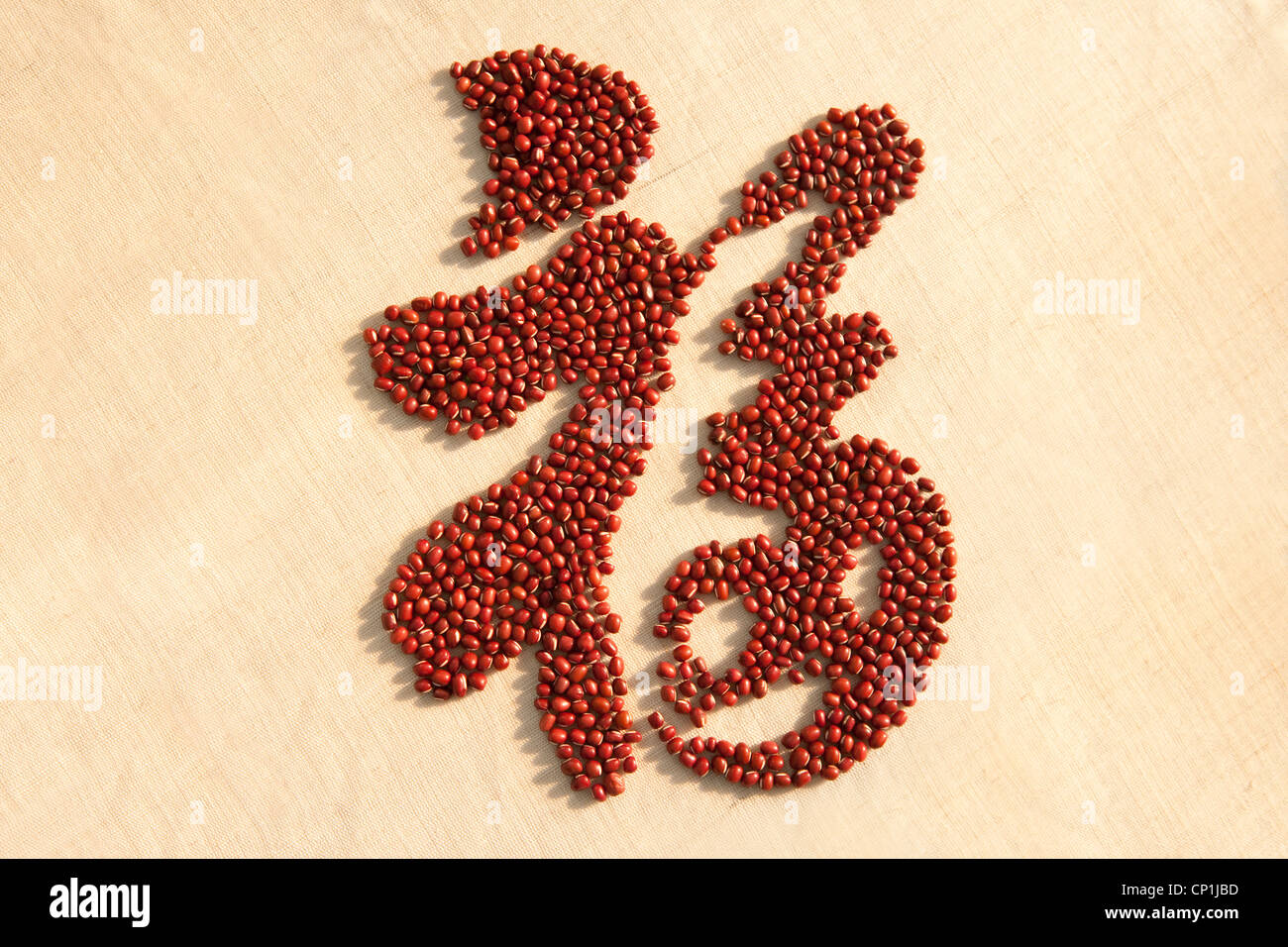 Chinese calligraphy made of red beans Stock Photo - Alamy