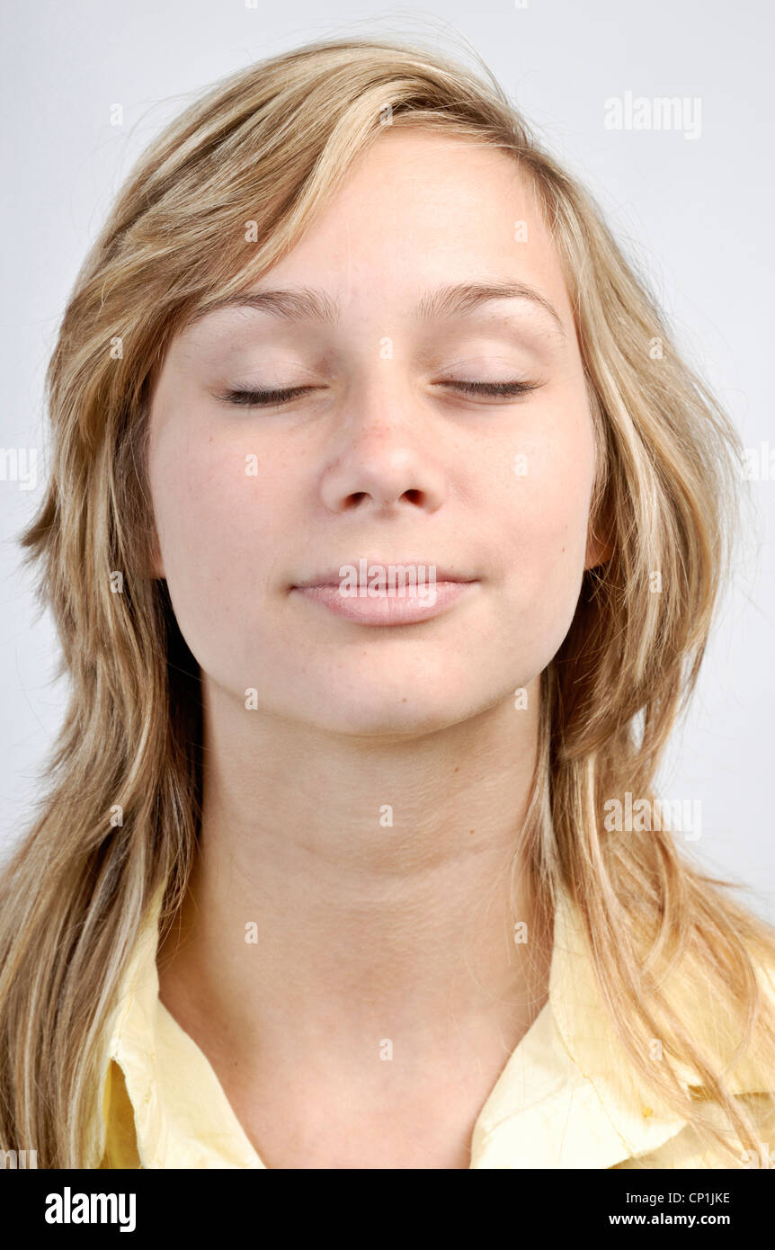 Woman eyes closed in meditation hi-res stock photography and images - Alamy