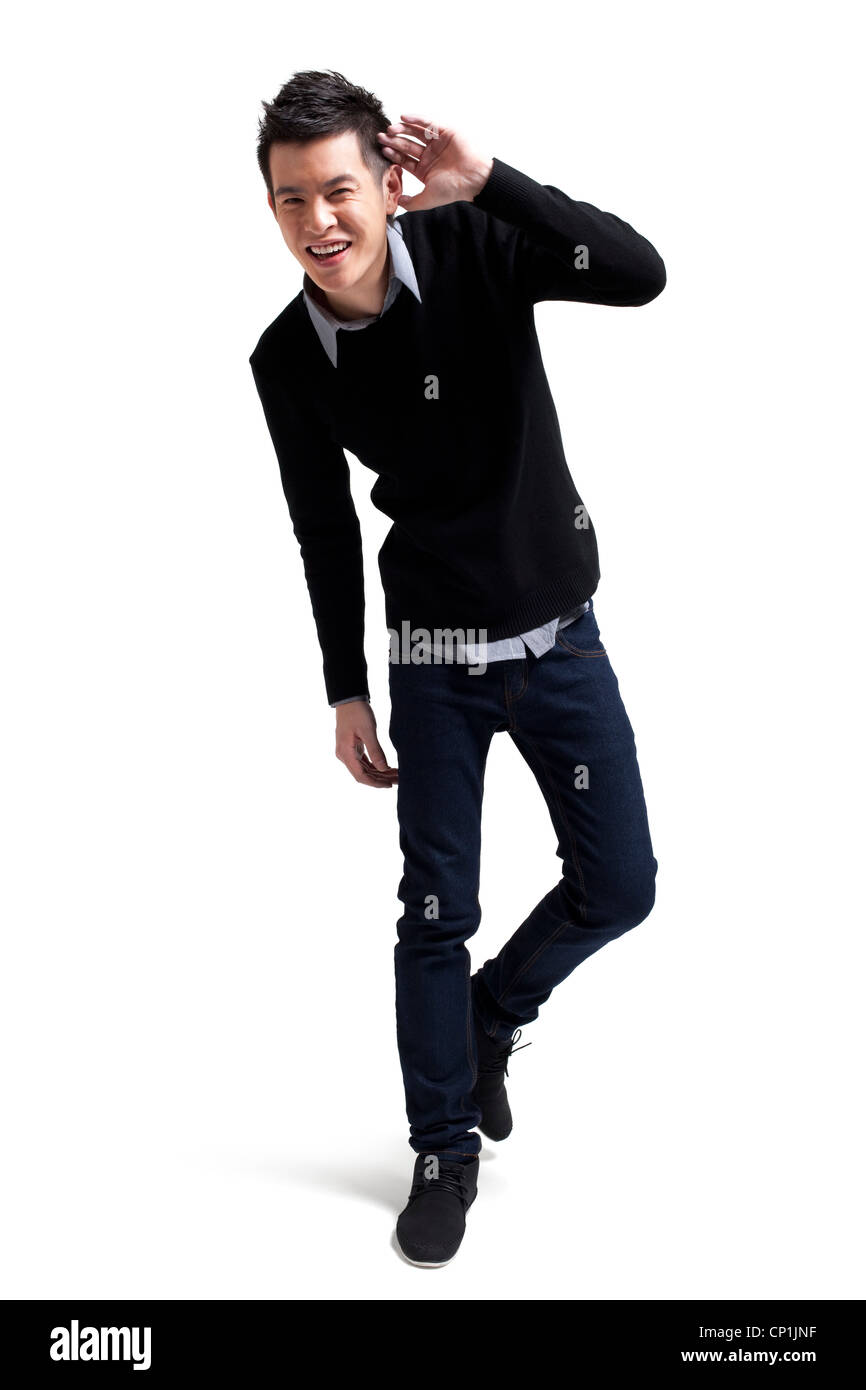 Young man listening Stock Photo - Alamy