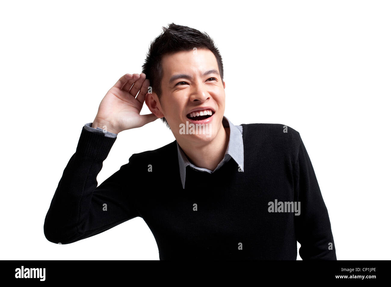 Young man listening Stock Photo - Alamy