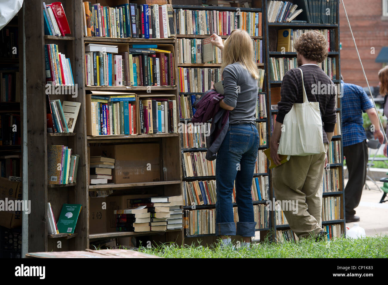 People shopping for books on shelves at Baltimore Book Festival Stock ...