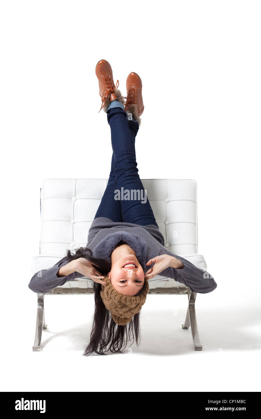 Woman beautiful legs crossed chair Cut Out Stock Images & Pictures - Alamy