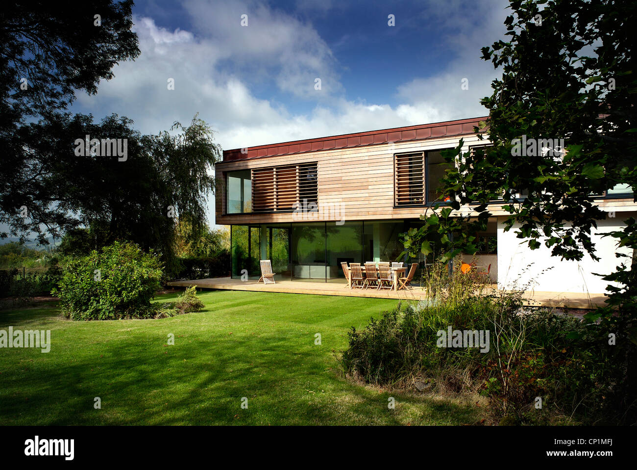 Timber clad exterior of modern residential home in Ubly, Somerset, UK ...