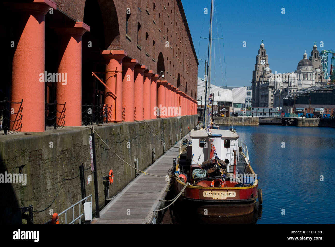View of the renovated Albert Docks with a view towards the Three Graces ...