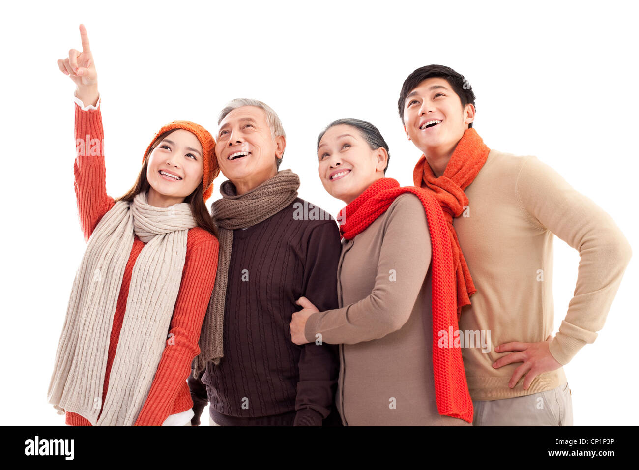 Family members looking afar and pointing the front Stock Photo - Alamy