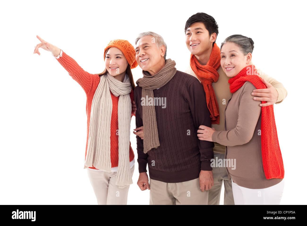 Family members looking afar and pointing the front Stock Photo - Alamy