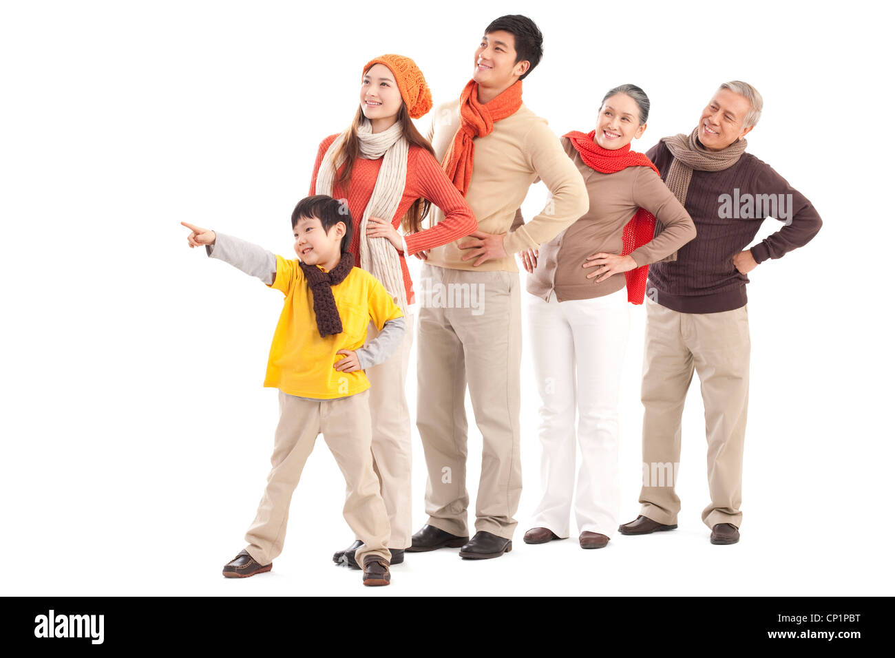 Family members looking afar and pointing the front Stock Photo - Alamy