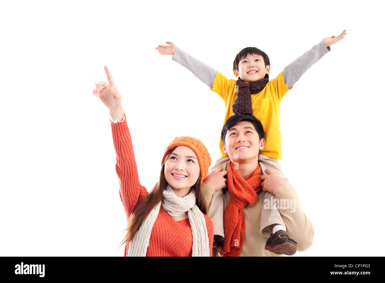Happy family looking afar Stock Photo - Alamy
