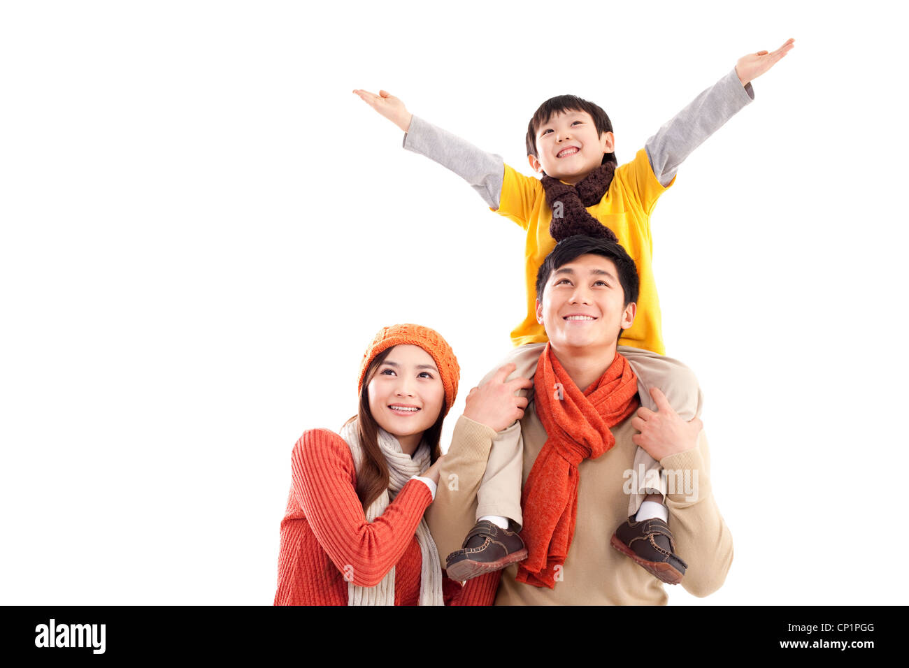 Happy family looking afar Stock Photo - Alamy