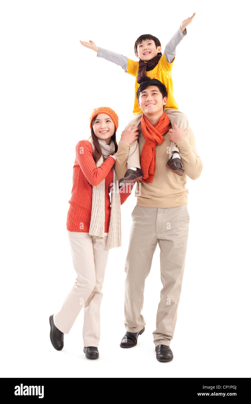 Happy family looking afar Stock Photo - Alamy