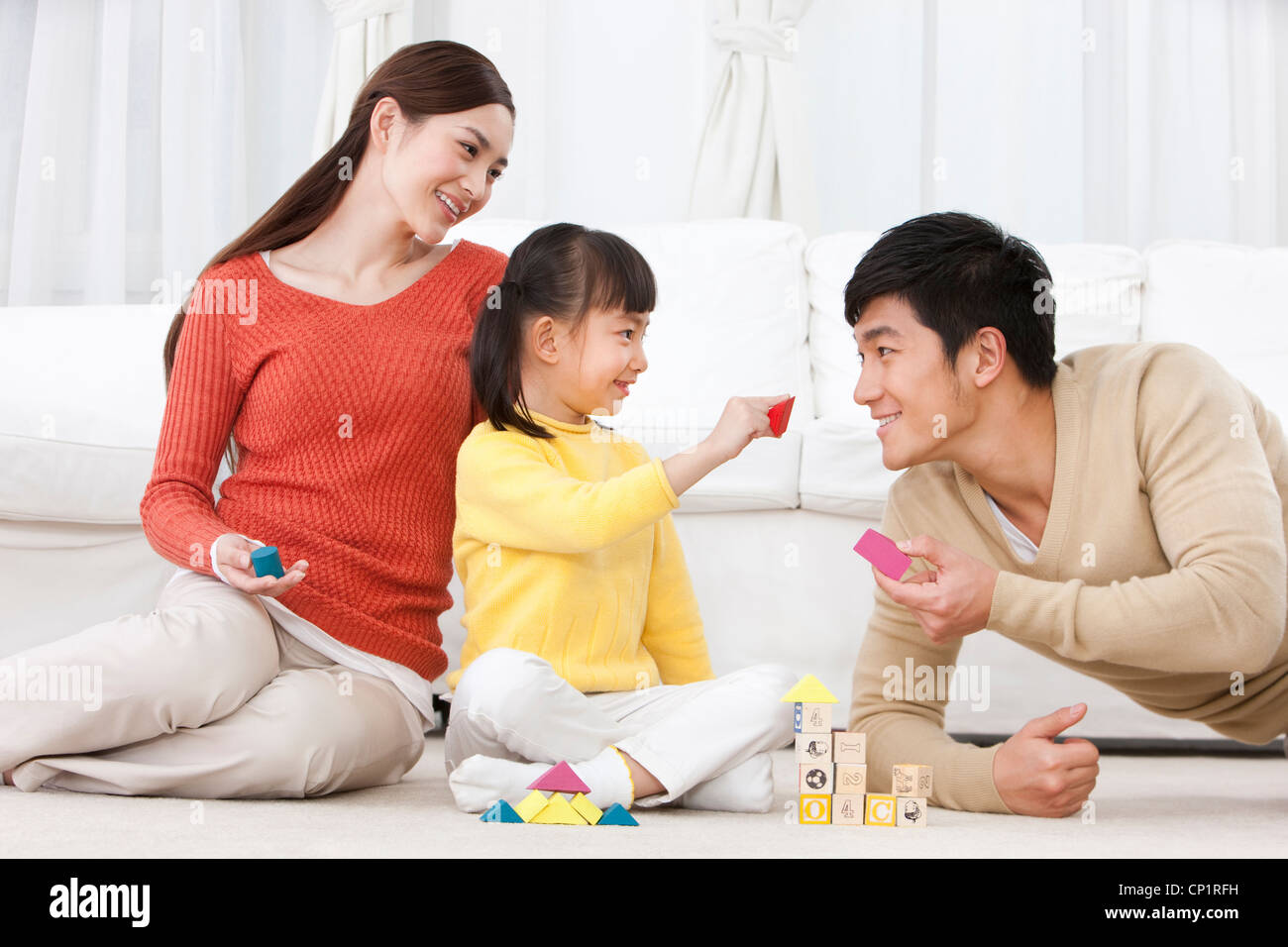 Family having fun together Stock Photo - Alamy