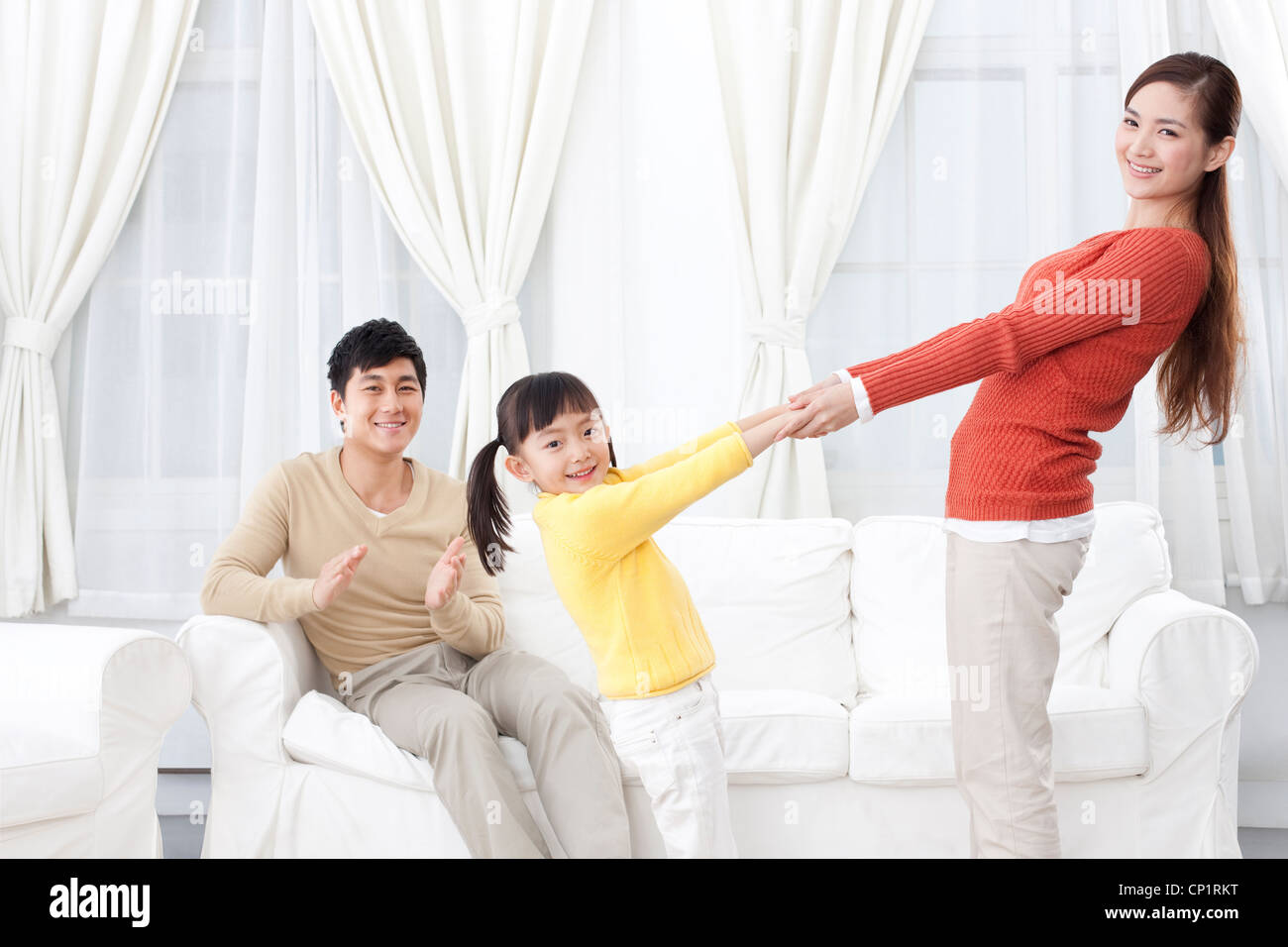 Family having fun together Stock Photo - Alamy