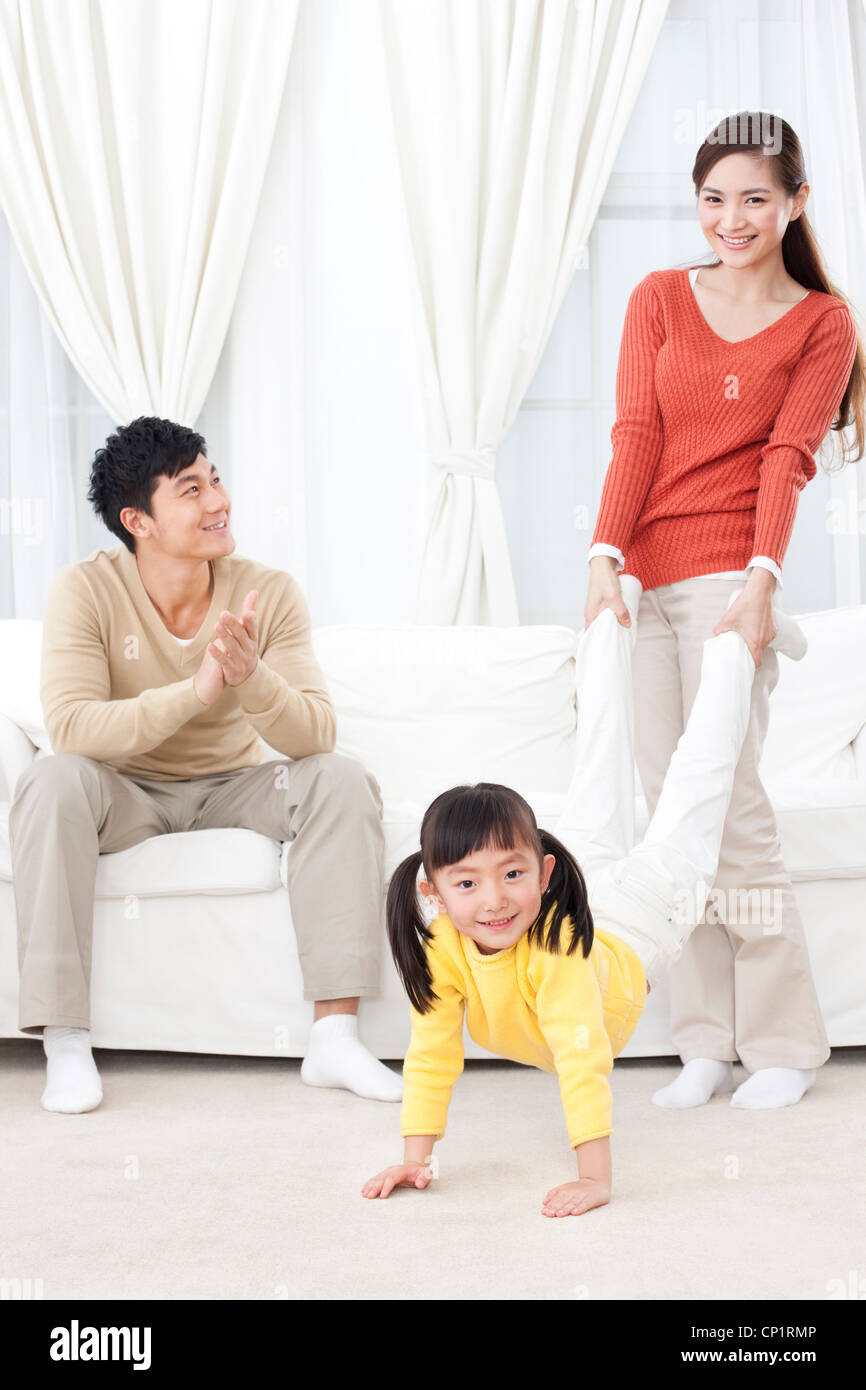 Family having fun together Stock Photo - Alamy