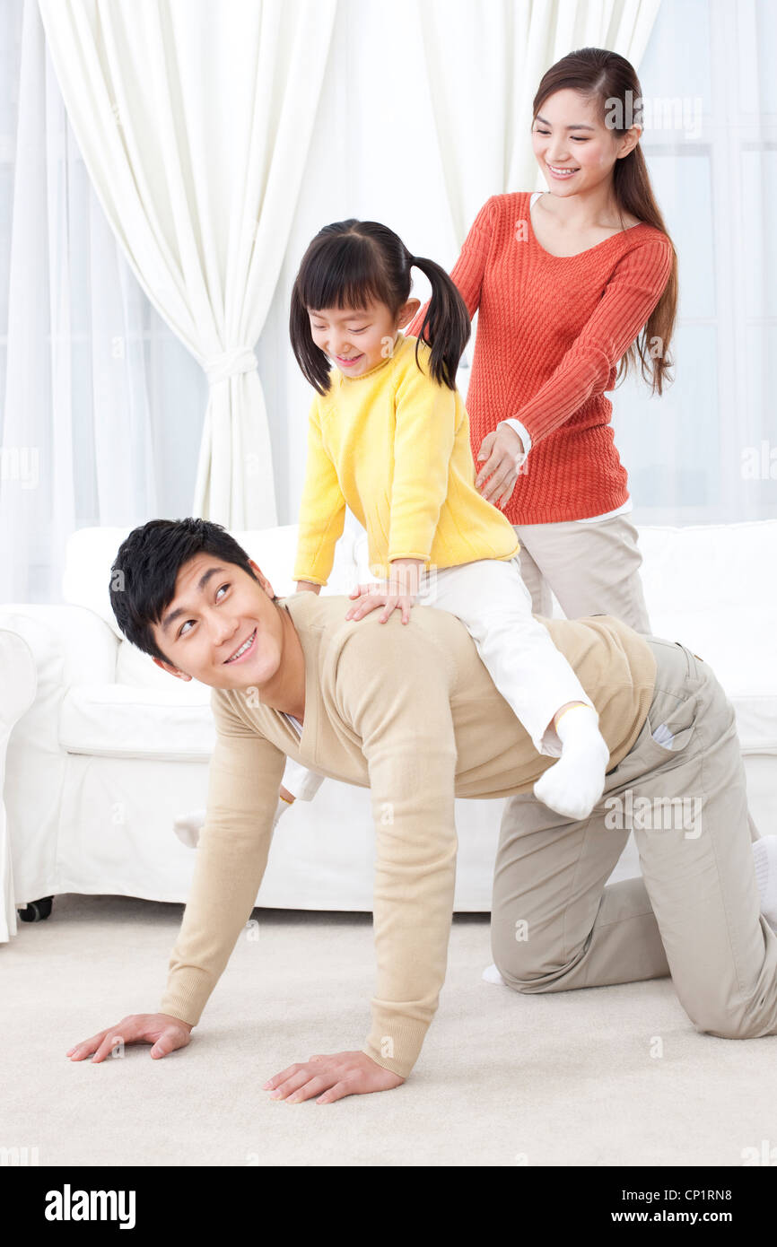Family having fun together Stock Photo - Alamy