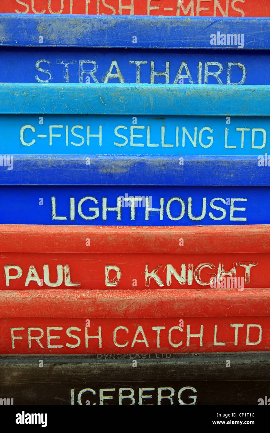 Stack of fishing crates at quayside Stock Photo - Alamy