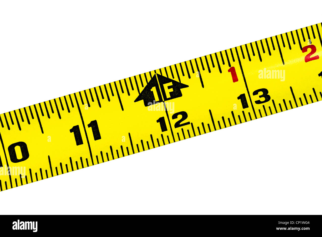Yellow metal tape measure at about the one foot mark isolated on a pure ...