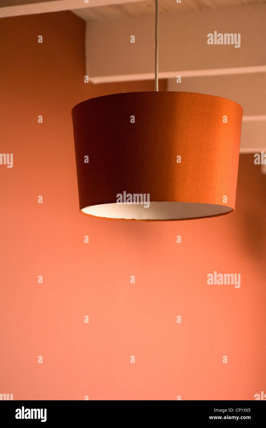 Orange ceiling lampshade in residential home, close up Stock Photo - Alamy