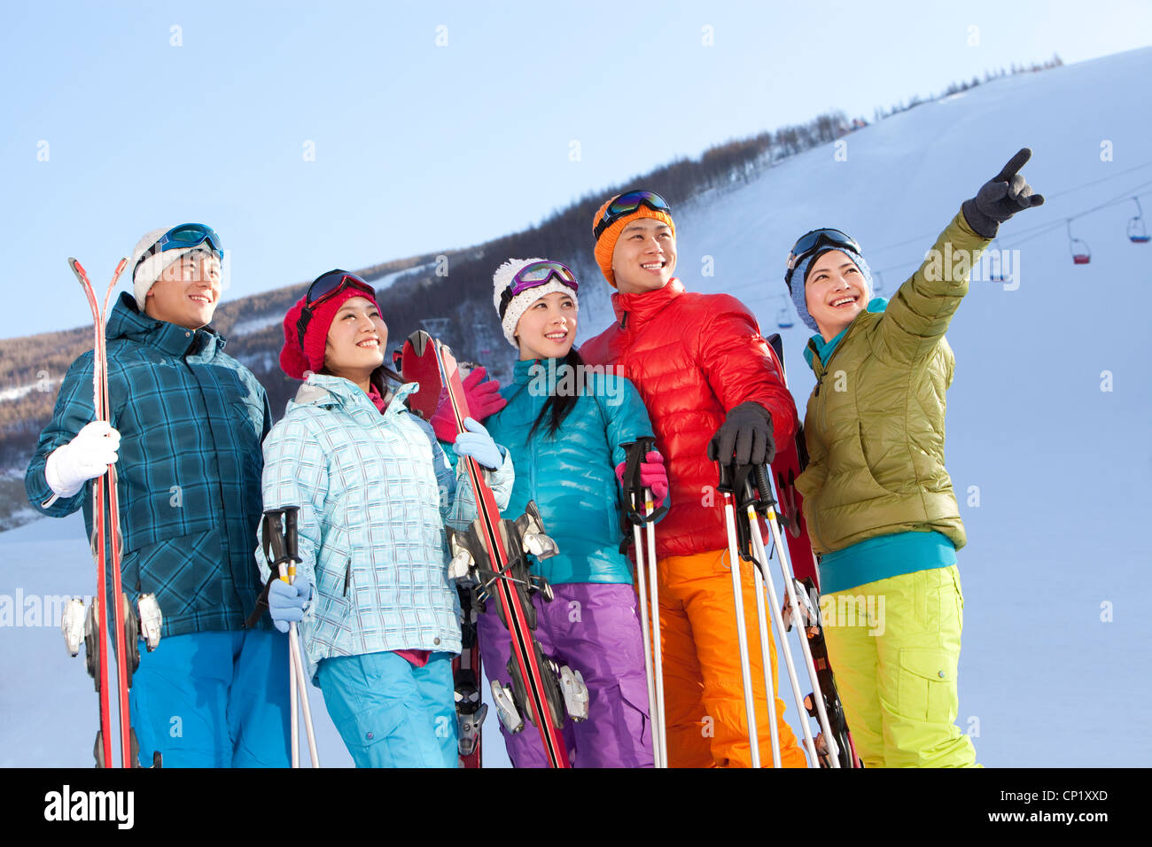 Young people going for skiing Stock Photo - Alamy