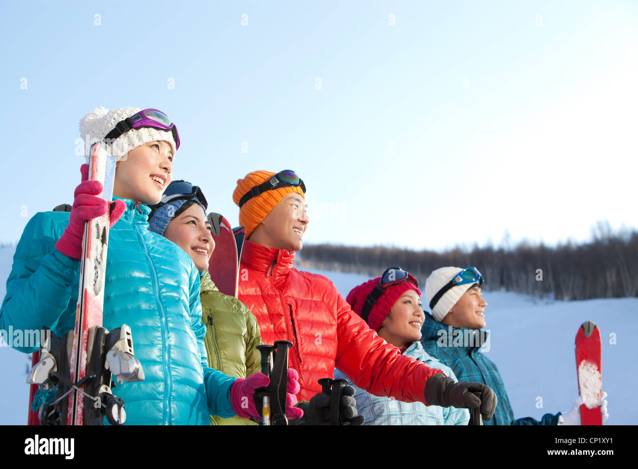 Group young people downhill skiing hi-res stock photography and images ...