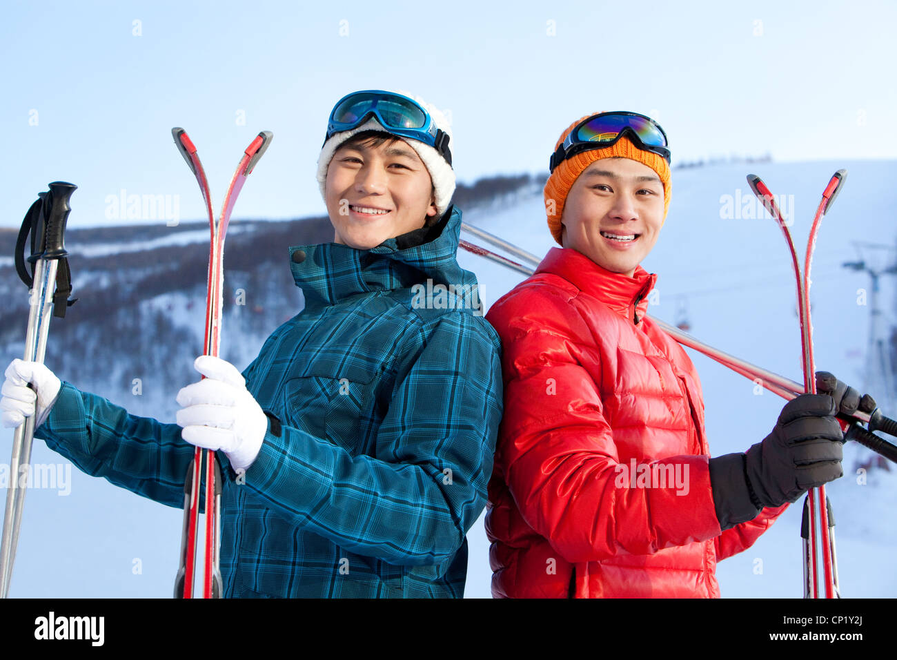 Two people going skiing hi-res stock photography and images - Alamy