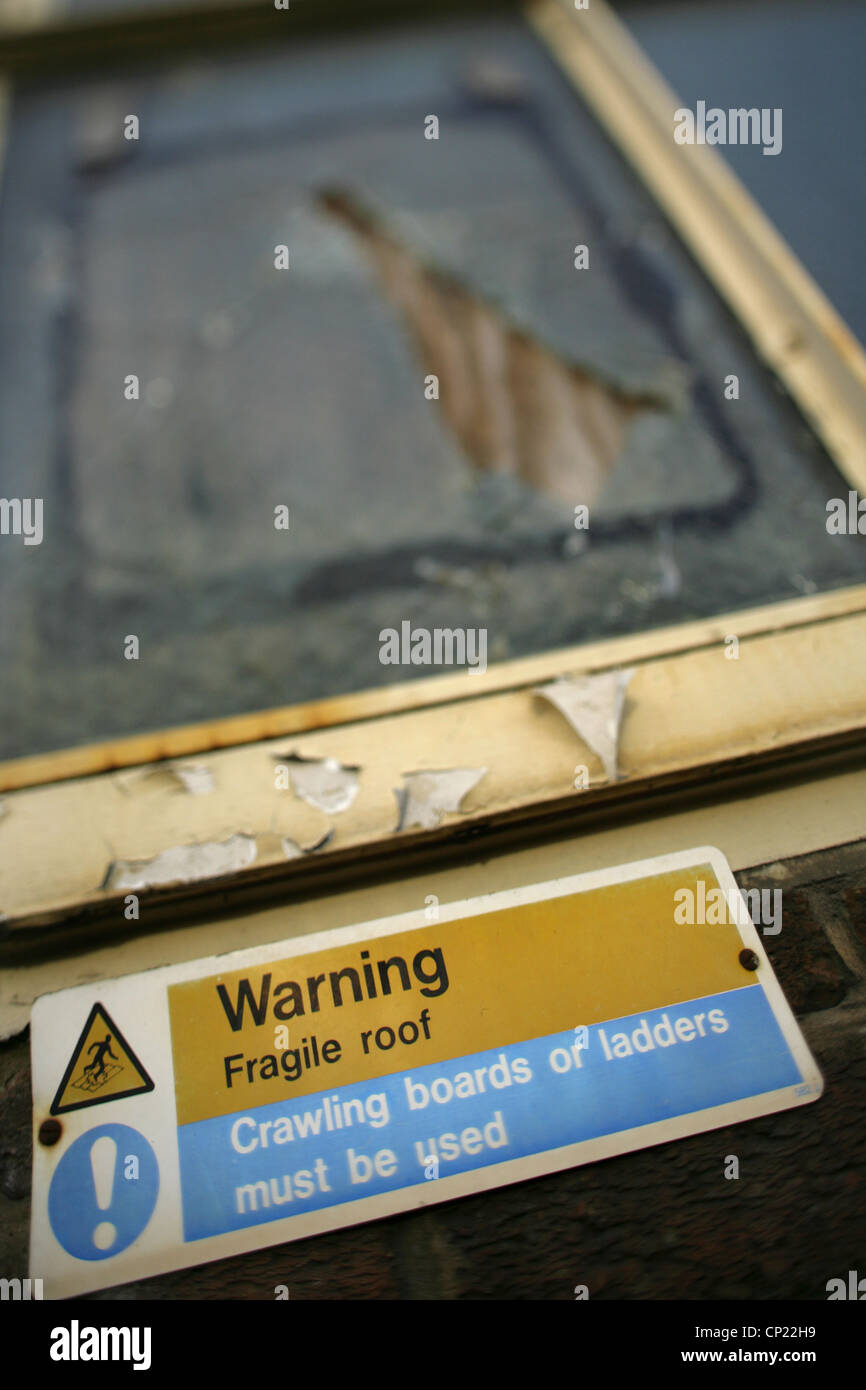 Danger sign warning broken glass hi-res stock photography and images ...