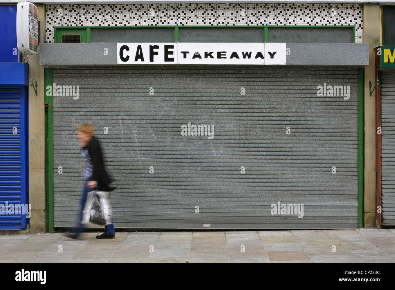 Closed high street cafe Stock Photo - Alamy