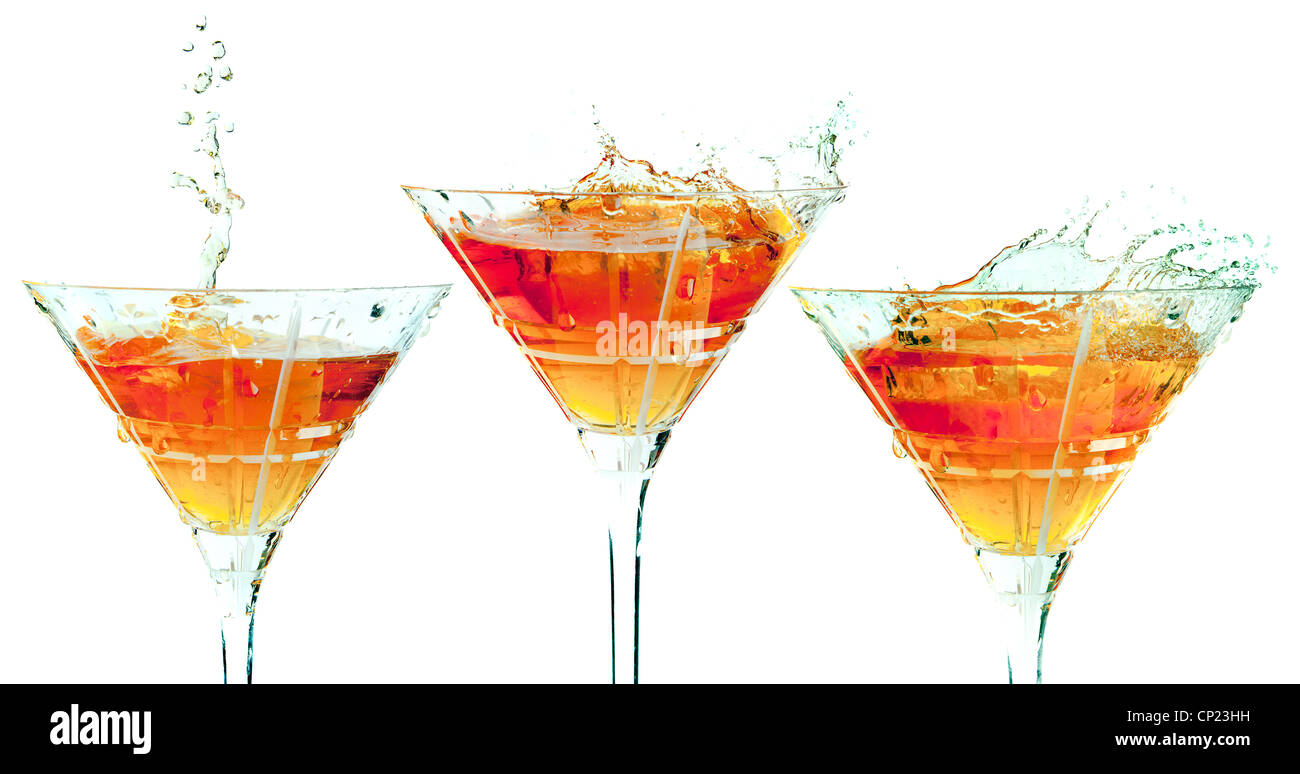 Collage of three orange cocktails with splashes Stock Photo - Alamy
