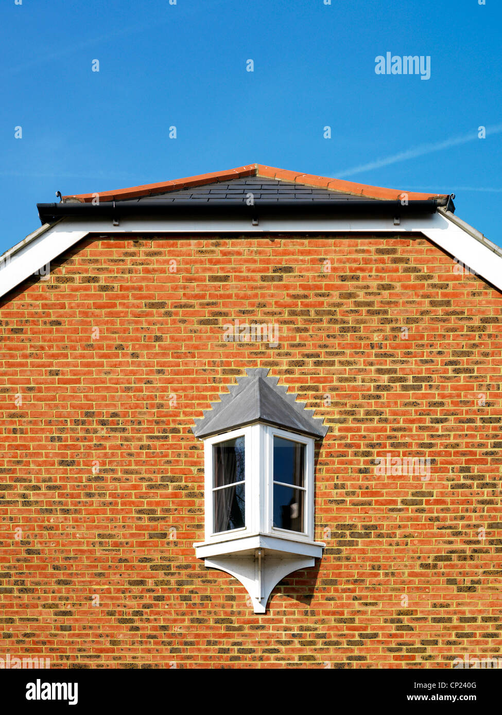 Lenham Community Centre. Detail of small oriel window on side of brick ...