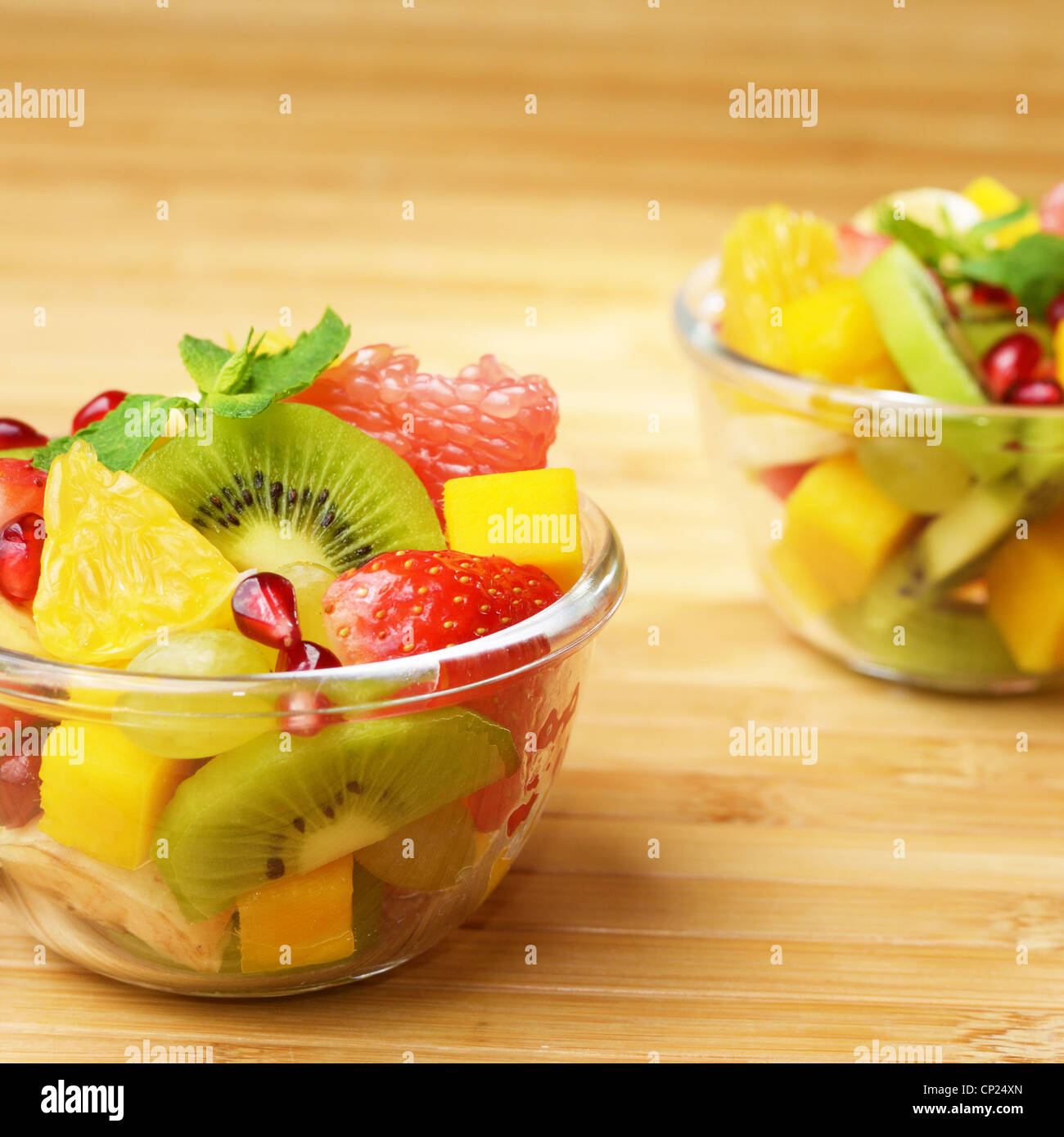 Fruit mix in the glass bowl Stock Photo - Alamy