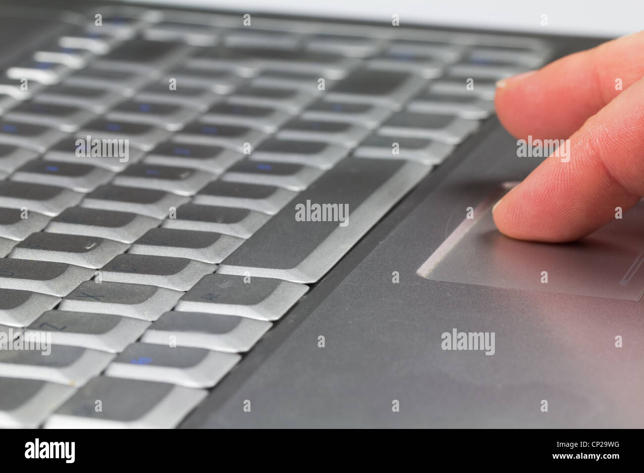 Fingers on a Touch pad Stock Photo - Alamy