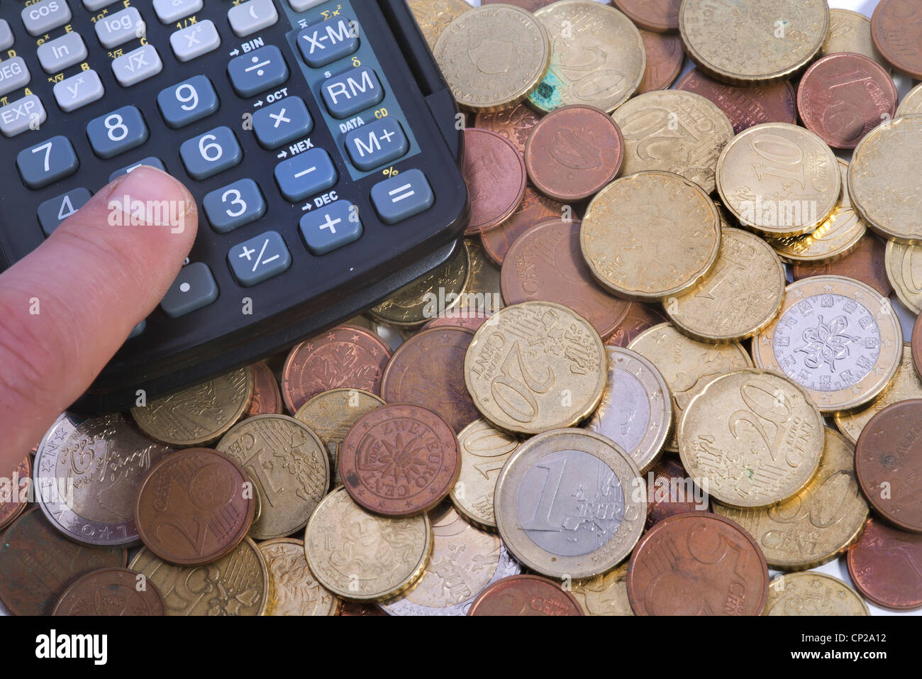 Coins stack calculator dollar hi-res stock photography and images - Alamy
