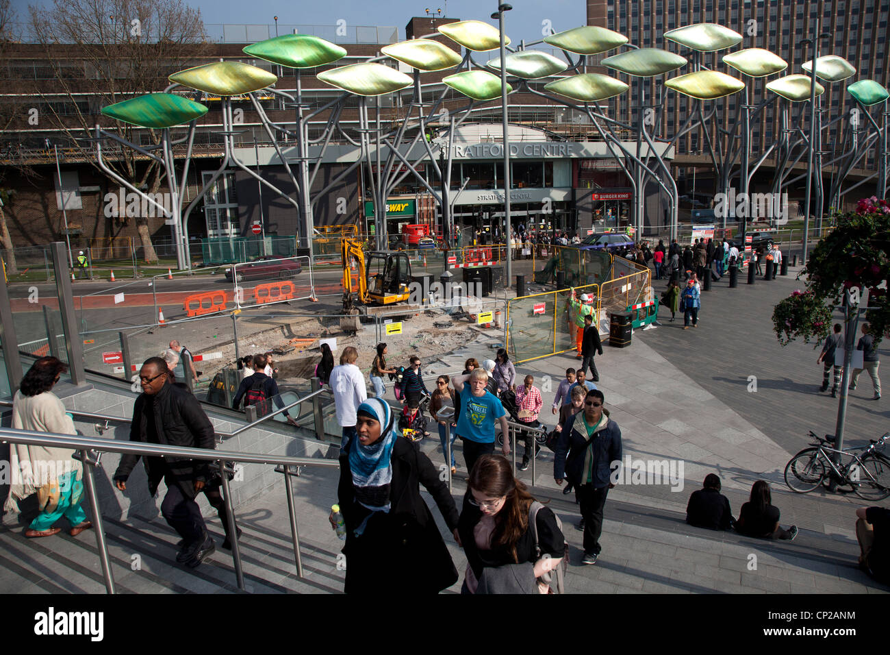 People walk away from the old Stratford Shopping Center towards the new ...