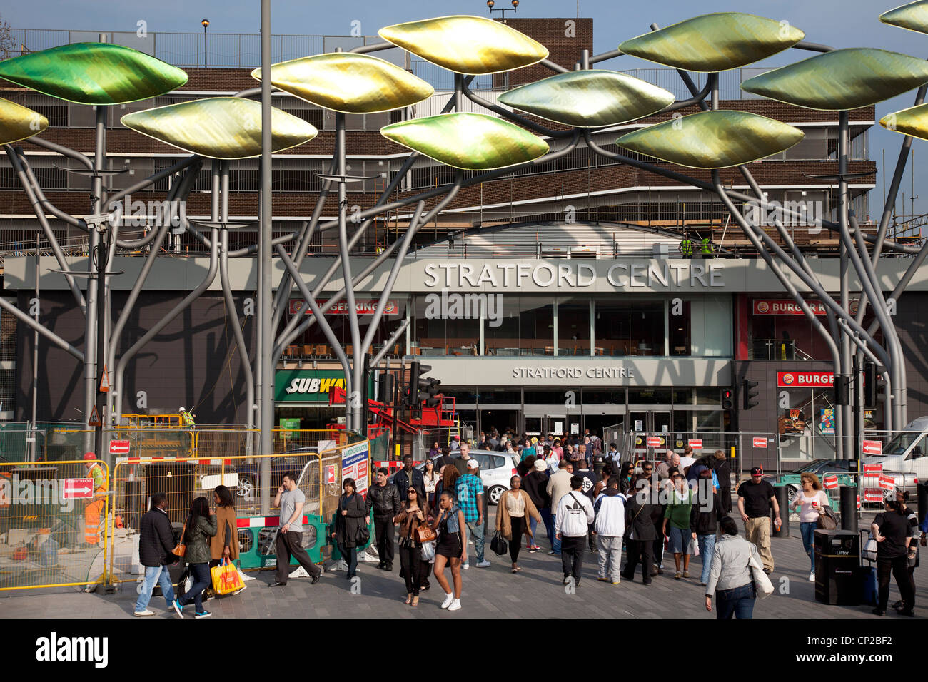 People walk away from the old Stratford Shopping Center towards the new ...