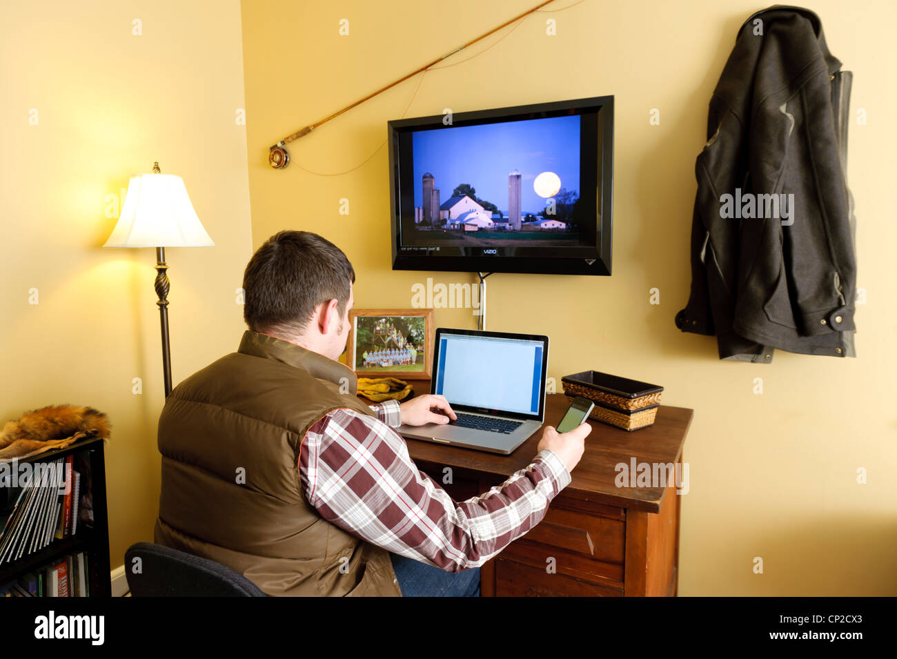 FARMER IN HOME OFFICE USING LAPTOP COMPUTER; WORKING FROM HOME Stock ...