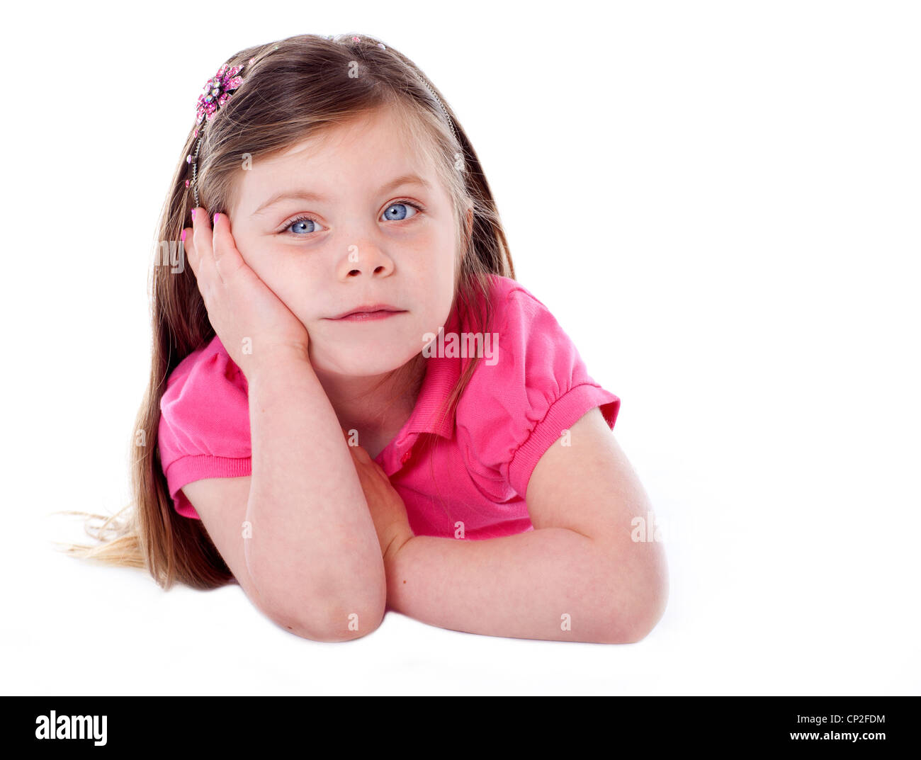 Cute girl leaning on hand isolated on white Stock Photo - Alamy