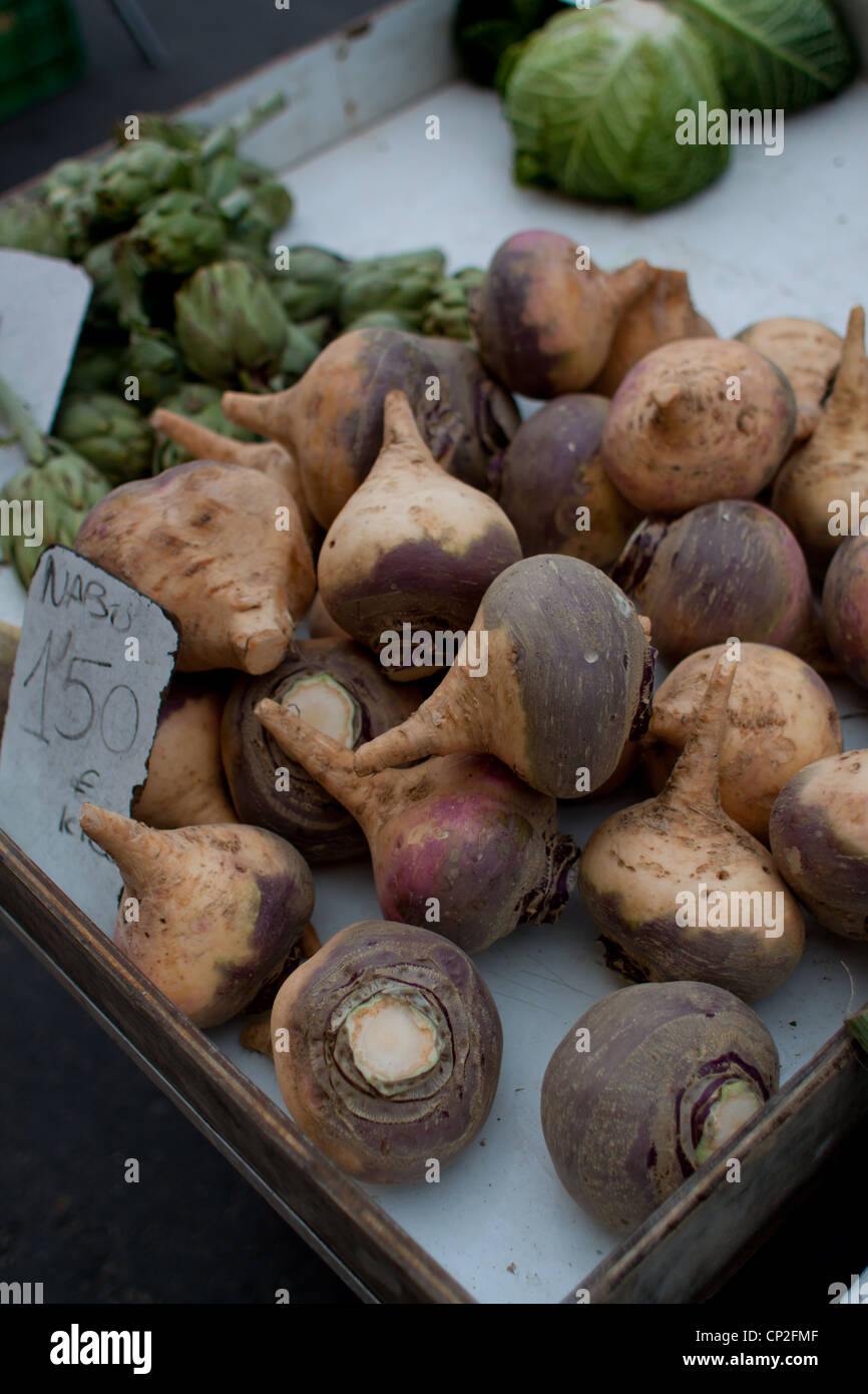 Farm fresh vegetables, including swede, artichokes and cabbage, on ...