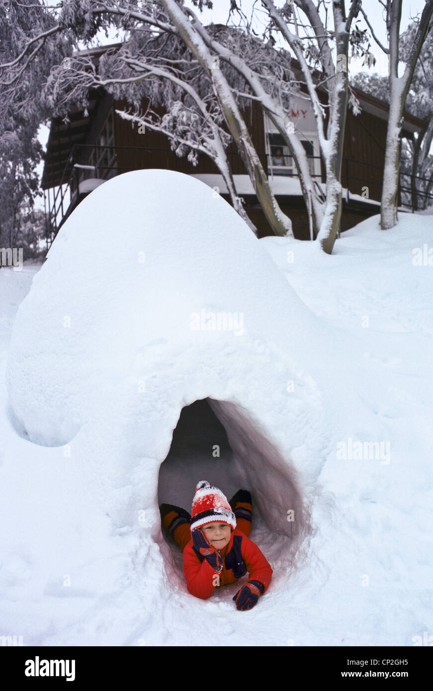 Little boy in igloo at ski resort Australia Stock Photo - Alamy